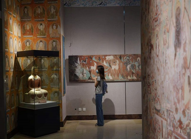 Dunhuang Mural Painting "A Deer of Nine Colors" Exhibits in Chongqing ...